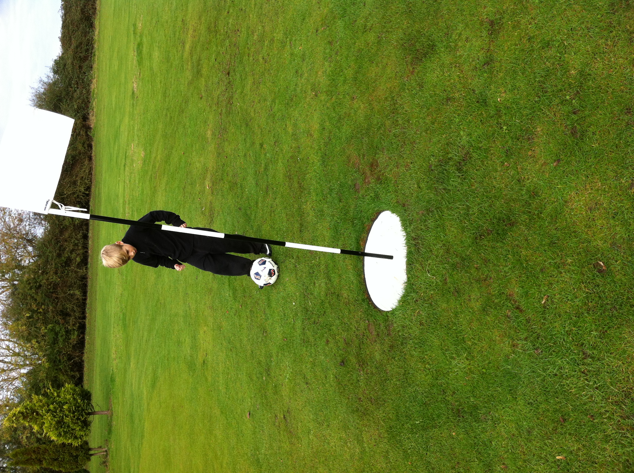 Putting the football in the hole at Stonham Barns | Crazy Golf Blog